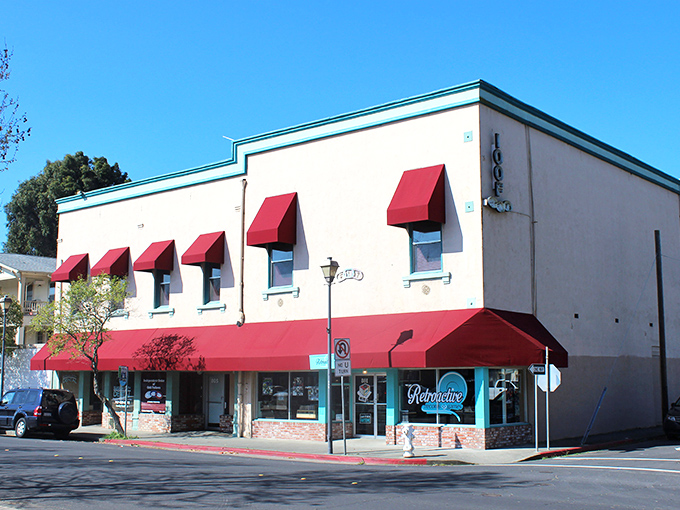 This isn't just a building with red awnings—it's a time capsule with modern purpose, where yesterday's architecture meets today's community needs. 