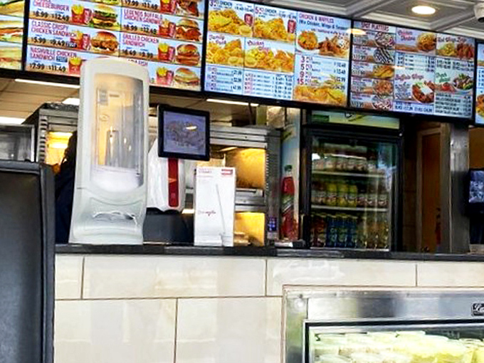 The order counter – where chicken dreams begin their journey to reality. Clean, efficient, and ready to transform cravings into crispy satisfaction.