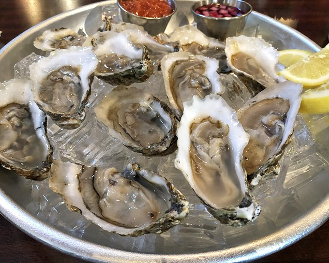 Fresh oysters on ice—nature's perfect appetizer. These briny treasures need nothing more than a squeeze of lemon and a moment of appreciation.