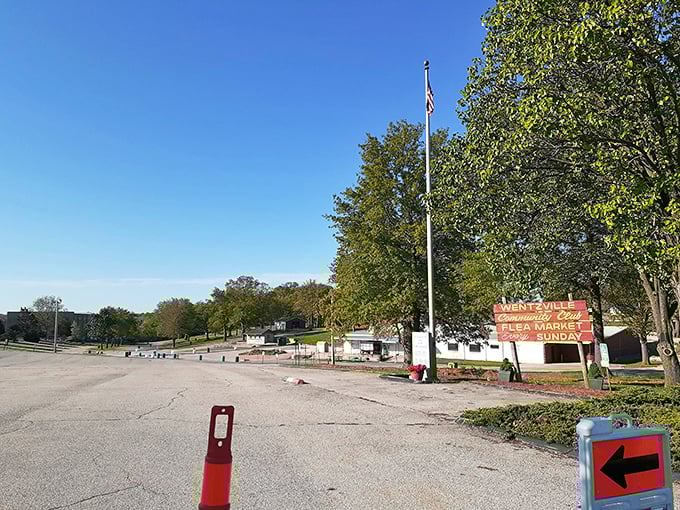 The calm before the treasure-hunting storm. Early morning at the market entrance promises adventures and discoveries for those willing to explore.