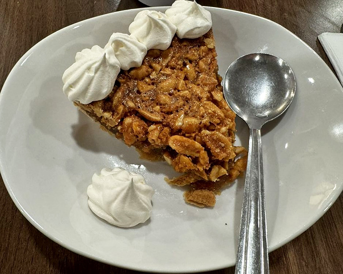 Their famous peanut pie – where Virginia's agricultural pride meets dessert genius. Those peanuts aren't just a topping, they're a celebration.
