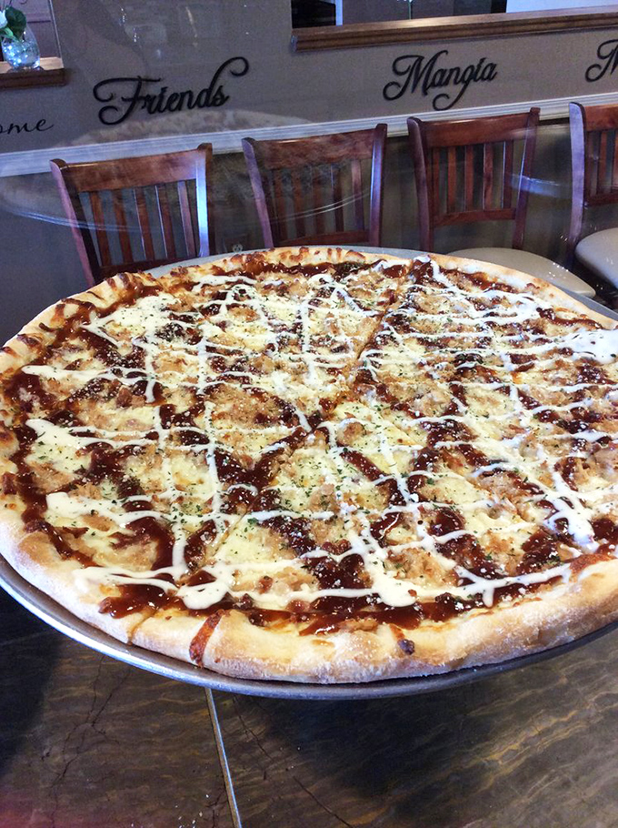 Sweet meets savory in this specialty pie, where the perfect crust serves as canvas for a drizzle-topped masterpiece that defies pizza conventions.
