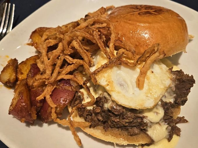 A rib sandwich that doesn’t just satisfy hunger—it obliterates it. Those crispy onion strings are the crown jewels of comfort food.