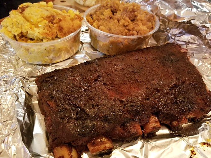 Ribs with the perfect bark, sitting alongside creamy sides. This tray is the definition of "no regrets" dining.