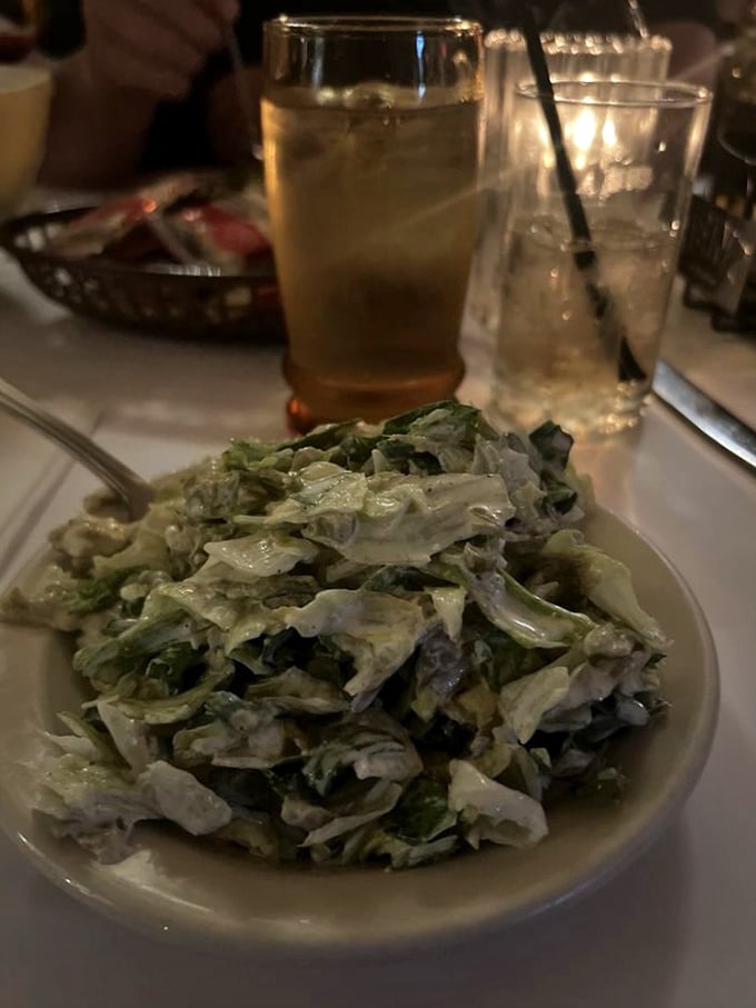 A proper steakhouse salad doesn't apologize for being simple – it cleanses the palate and prepares you for the meaty main event to come.