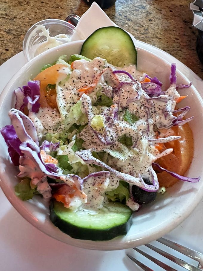 Even the salad looks like it's dressed for a sock hop – crisp, colorful, and proving healthy eating existed before kale was cool.