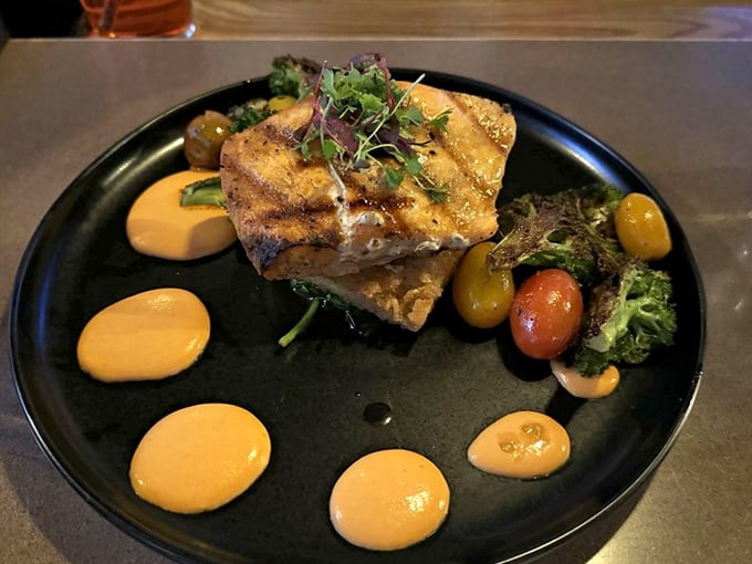 Salmon that's dressed better than most people at a wedding, with colorful accompaniments that aren't just there to look pretty.
