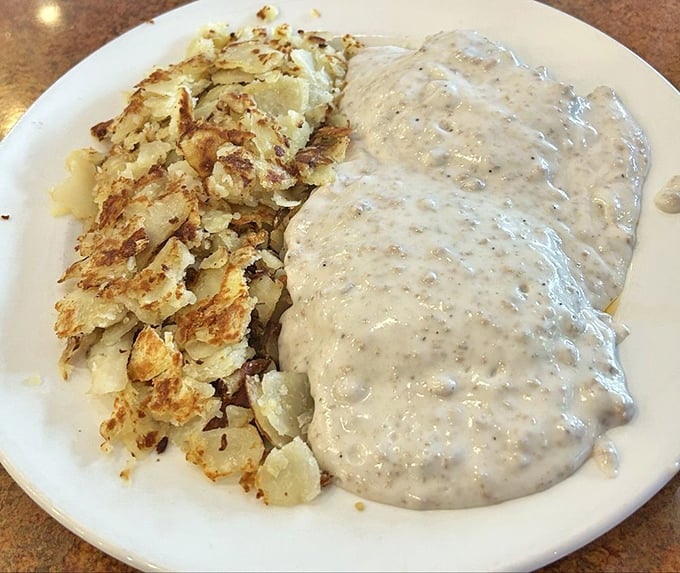 Sausage gravy and home fries—the breakfast combination that's been comforting souls since before comfort food was even a term. 