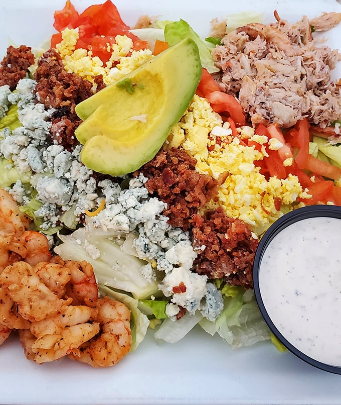This Seafood Cobb Salad doesn't just break rules—it creates new ones, with a protein parade of shrimp and tuna alongside traditional fixings.