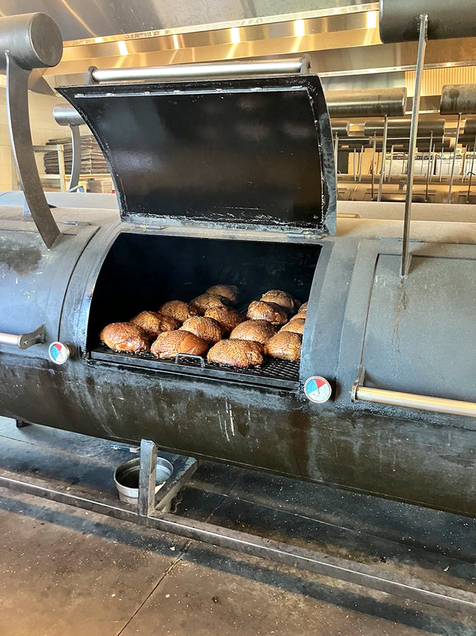 Smoking turkey to juicy perfection—proof that Thanksgiving should probably be a weekly affair rather than just an annual obligation.