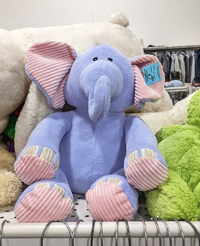 This blue elephant isn't just adorable—he's the ambassador of the toy section. His corduroy ears have heard the wishes of children across generations.
