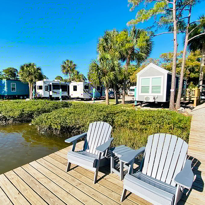 At Sunset Isle RV Resort, Adirondack chairs invite contemplation of life's big questions, like "Why didn't I move here sooner?" and "Is it too early for happy hour?"