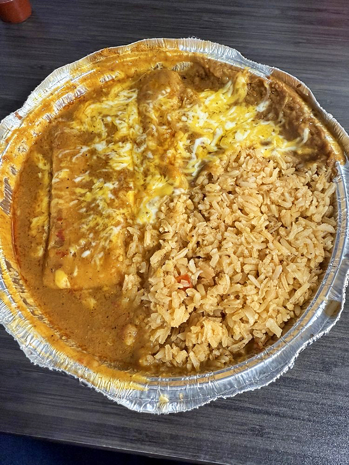 This enchilada isn't messing around. The vibrant sauce and perfectly cooked rice create the comfort food equivalent of a warm hug.