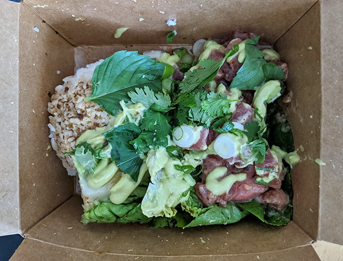 A box of freshness that puts sad desk lunches to shame. This vibrant salad proves that sometimes vegetables deserve the spotlight too.