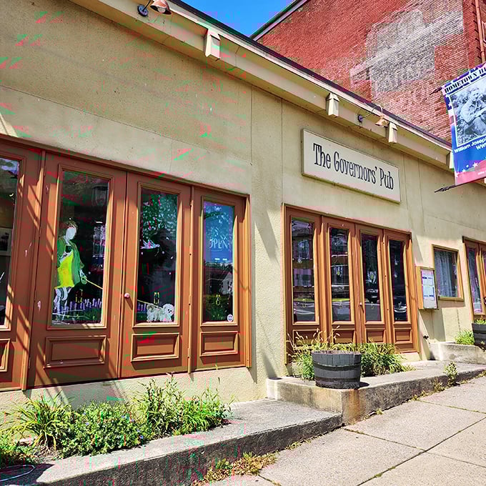 The Governors' Pub doesn't just serve food—it offers a side of history with those wooden doors that have welcomed hungry patrons for generations.