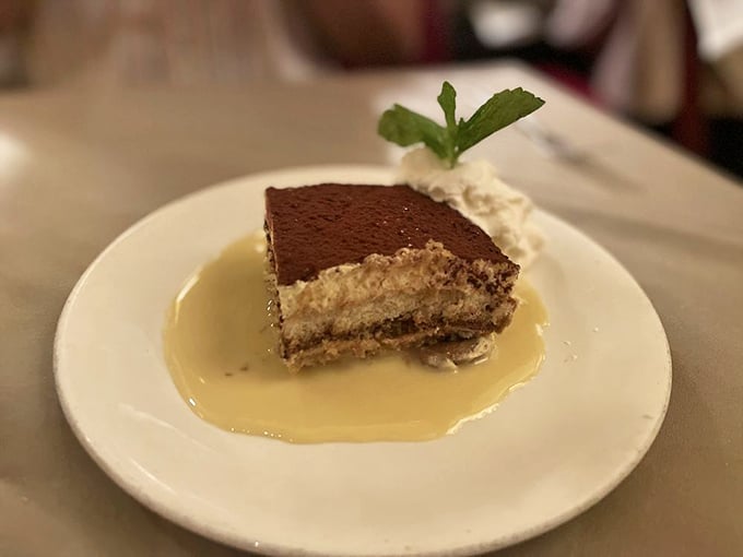 Tiramisu offers a creamy Italian escape after your thoroughly British beef adventure, because why choose sides?