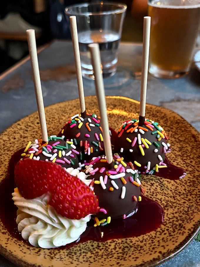 Chocolate cake pops with rainbow sprinkles – because sometimes the most sophisticated dessert is the one that makes you smile like you're eight years old again.