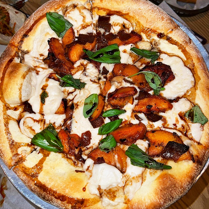 Vegan grilled peach pizza that makes you question everything you thought you knew about plant-based dining. Sweet meets savory in harmony.
