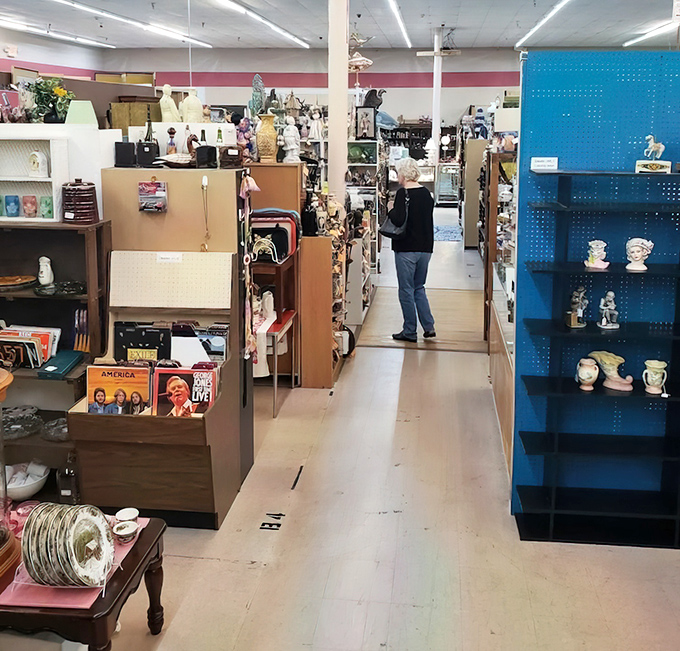 The quintessential antique mall experience – losing yourself in narrow aisles where every turn reveals something you suddenly "need."