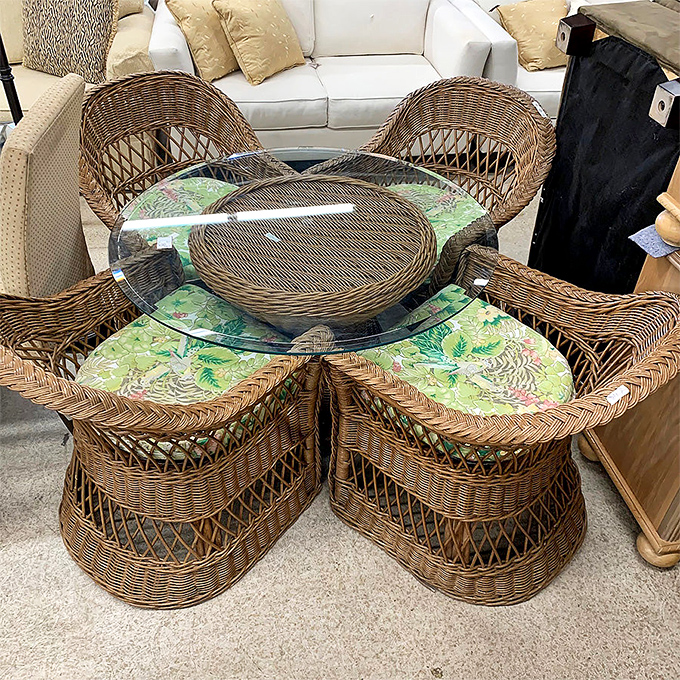 This wicker dining set whispers promises of leisurely brunches and sunset cocktail conversations.