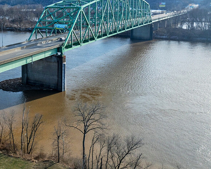 This isn't just a bridge—it's a steel and concrete poem connecting communities across waters that have witnessed centuries of American life.