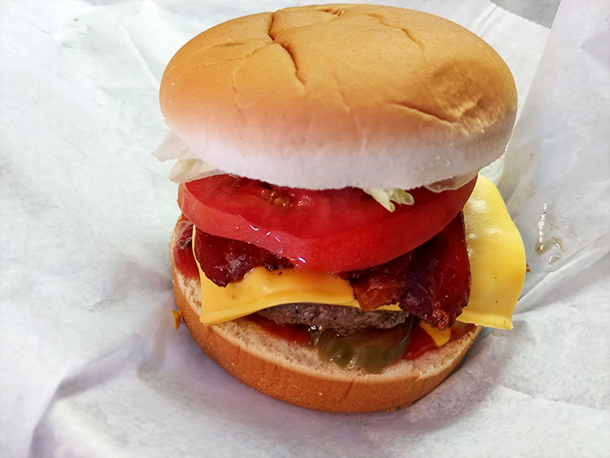 This bacon cheeseburger isn't trying to impress food critics—it's busy making real people incredibly happy with its juicy, cheesy, bacon-y perfection.