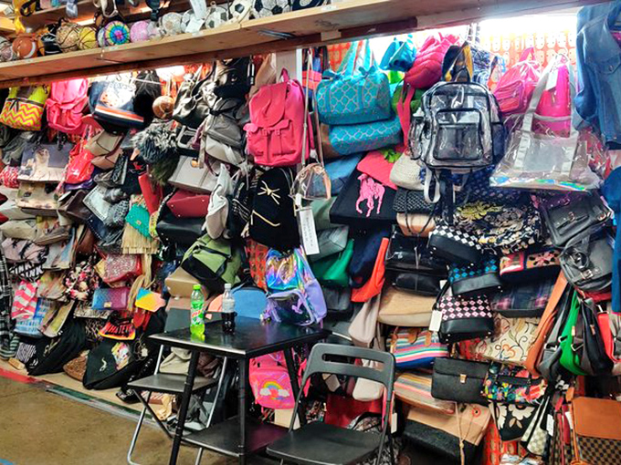 Bag heaven or organizational nightmare? This explosion of colorful carriers would make Mary Poppins question if her carpet bag is truly sufficient.