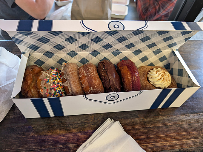 A box of possibilities—six different paths to happiness, each one more tempting than the last.