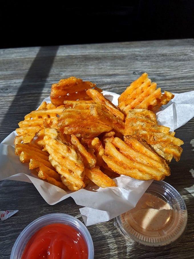 Golden, crispy, waffle-cut perfection. These fries aren't just a side dish—they're the supporting actor that sometimes steals the scene.