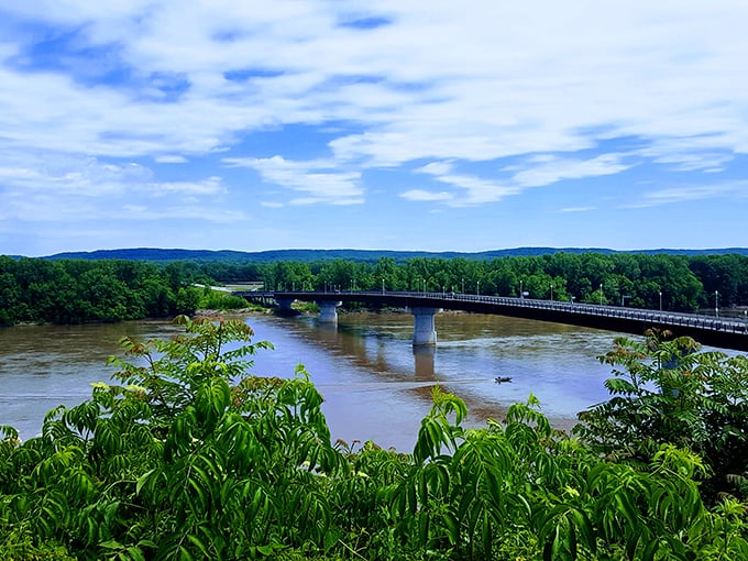 Hermann's bridge spans the Missouri River like a steel ribbon, connecting the town to the wider world while preserving its island of tranquility.