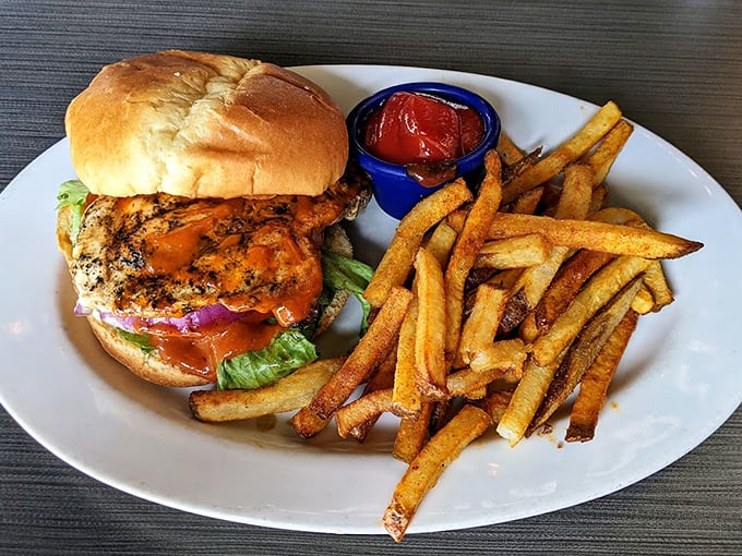 Not all heroes wear capes—some come on brioche buns. This buffalo chicken sandwich brings the heat without setting your taste buds into witness protection.