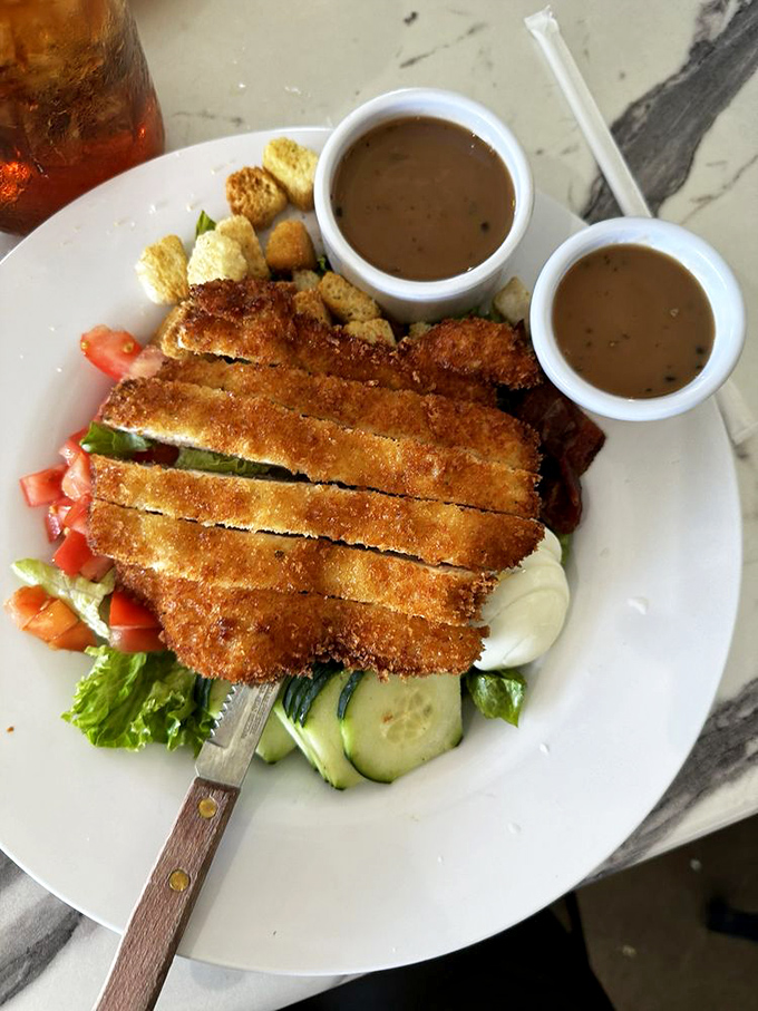 Even the chicken salad here refuses to be ordinary – fresh, generous, and clearly overachieving for lunch fare.