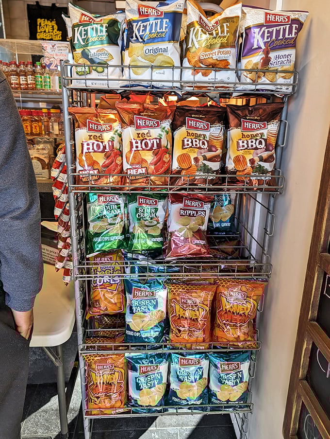 The chip rack—where decisions about which crunchy companion will join your sandwich become surprisingly philosophical life choices.