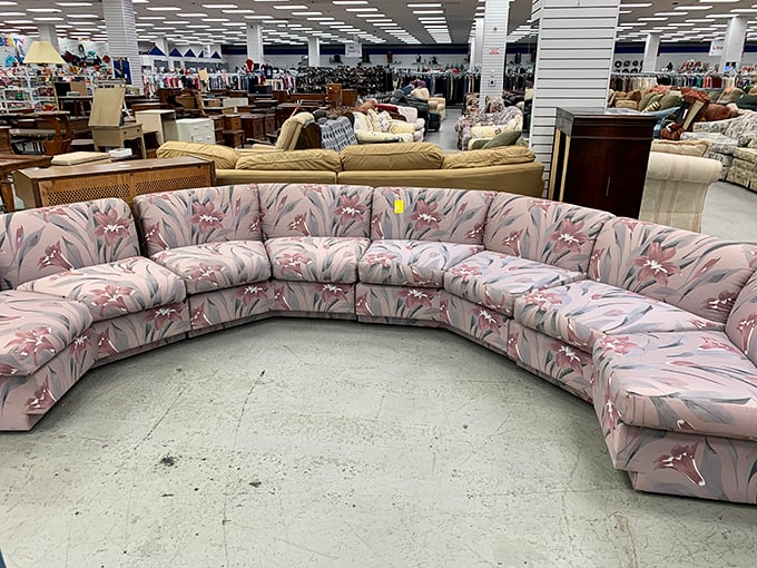 That floral sectional sofa isn't just seating—it's enough room for the whole family, three dogs, and still space for unexpected guests at Thanksgiving.