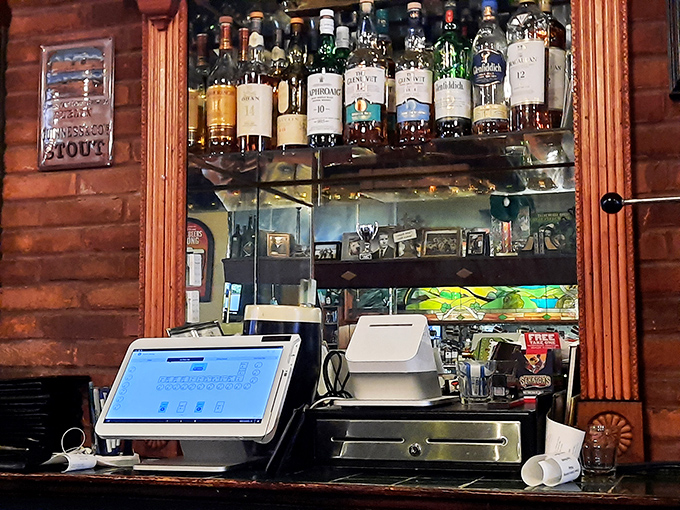 Behind every great pub is a well-stocked bar—whiskey bottles standing at attention like Celtic soldiers guarding liquid gold.