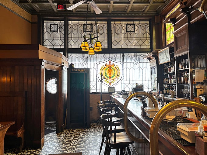 Stained glass windows filter daylight into the dining room, creating the kind of ambiance that makes you want to order another round and cancel your next appointment. 