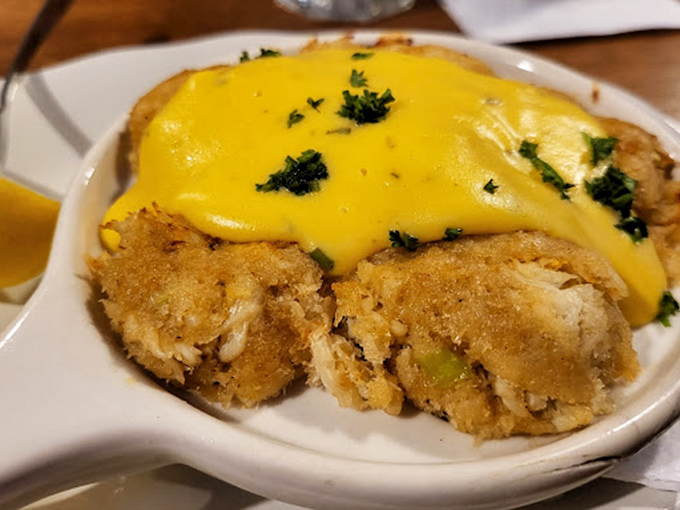 Crab-stuffed mushrooms under a blanket of cheese—proof that sometimes the best things in life come in small, savory packages.