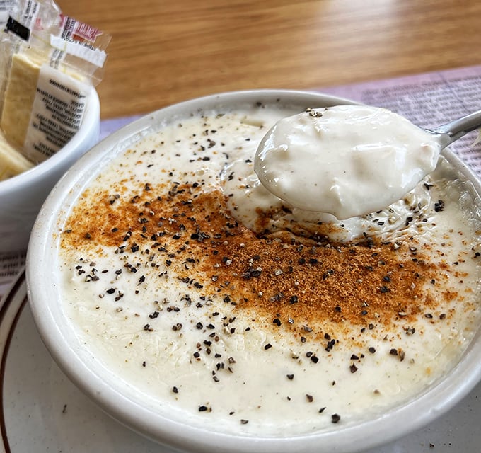 This cream of crab soup isn't just a starter—it's a warm hug in a bowl. The kind of comfort food that makes rainy days something to look forward to.