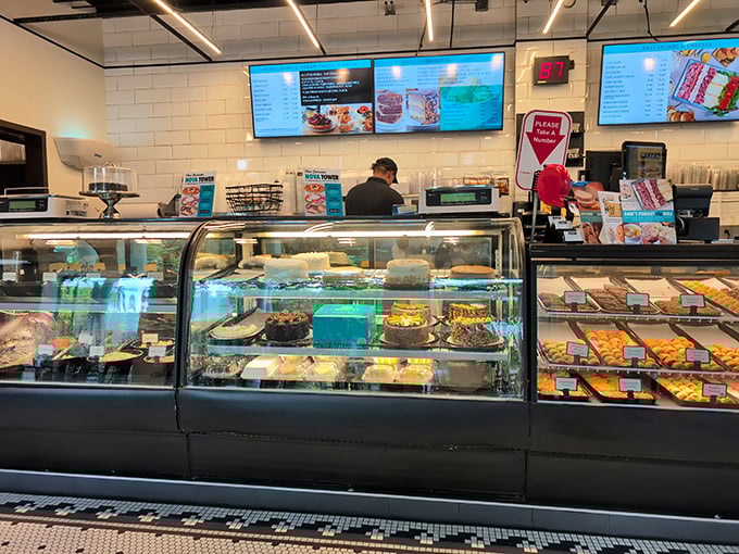 The dessert case at TooJay's—where willpower goes to die and "I'll just have a bite" becomes the lie you tell yourself.