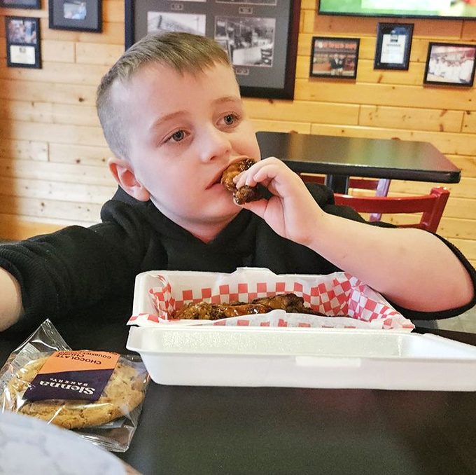 Even the youngest barbecue connoisseurs know when they've found the real deal – that look of pure concentration says it all.