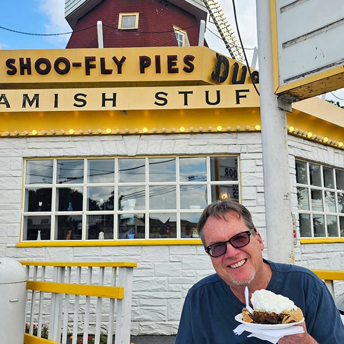 The windmill-topped exterior isn't just Instagram bait—it's a landmark that's been drawing sweet-toothed pilgrims for generations of family road trips.