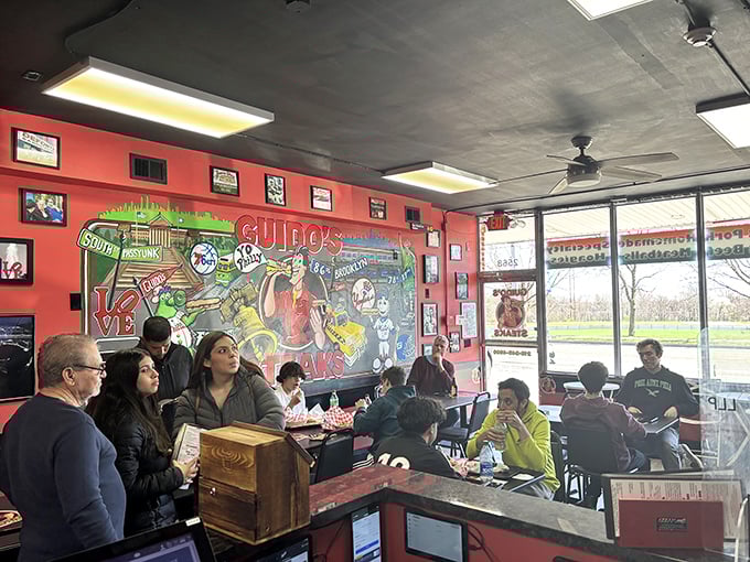 The lunch crowd knows where to find happiness – it's right here between these red walls and black tables.