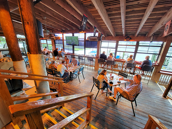 The multi-level dining room offers a treehouse feel for grown-ups, with exposed beams framing conversations and seafood celebrations.