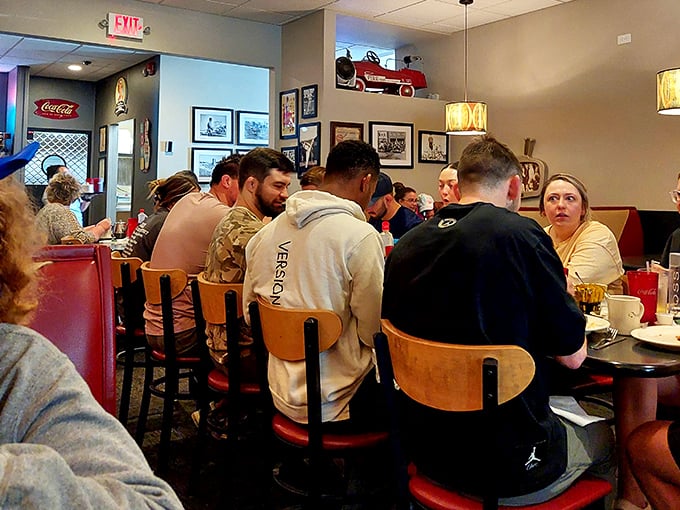 The breakfast club in session—a cross-section of Jefferson City gathering for their morning ritual. Democracy in action, with syrup on the side.