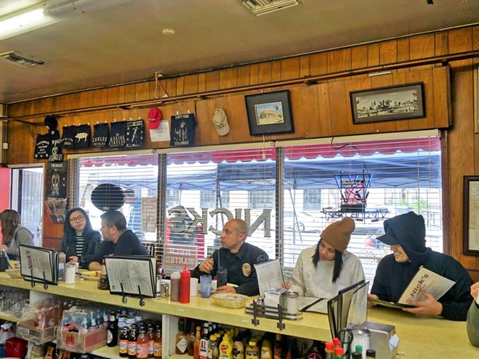 The horseshoe counter brings strangers together in the universal pursuit of excellent eggs and coffee—democracy in diner form.