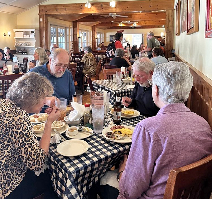 The dining room hums with conversation and clinking silverware—the soundtrack of happiness at mealtime in Nashville.