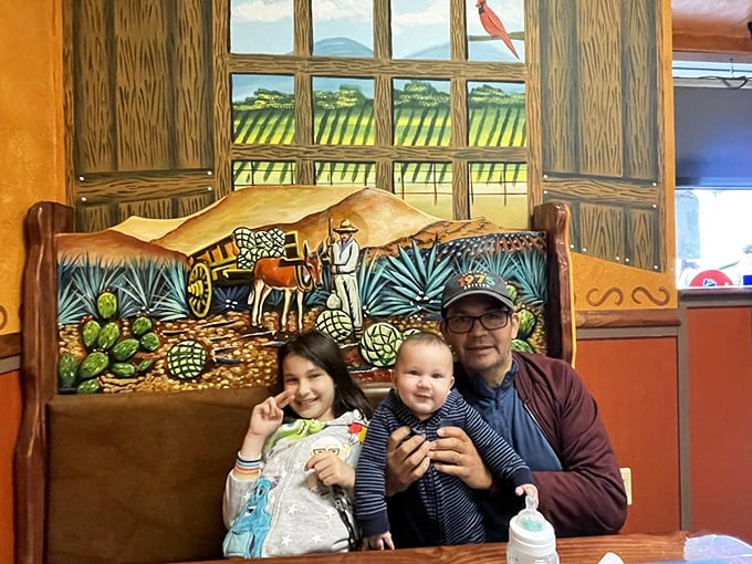 The vibrant murals aren't just decoration – they're portals to Mexico. Families gather for authentic meals against backdrops that enhance the cultural experience.