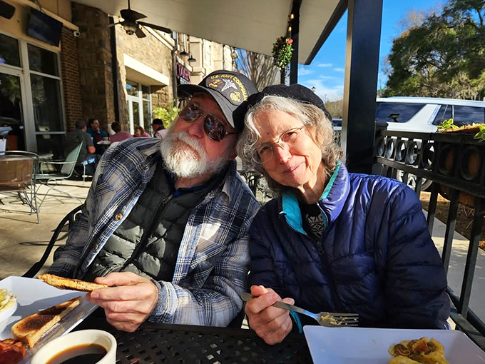 The outdoor patio: where happy diners soak up Florida sunshine between bites of étouffée and sips of sweet tea.