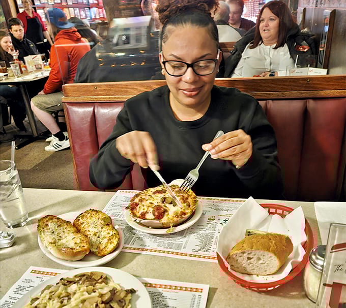 Every booth tells a story at Luigi's, where first dates become anniversaries and family dinners become traditions, one forkful at a time.