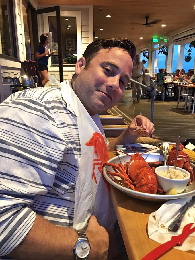 The universal expression of lobster joy. When the bib goes on, all pretense goes out the window—it's time for serious seafood business.